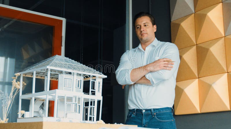 Business Engineer Looking at Camera while Standing with Arm Folded ...