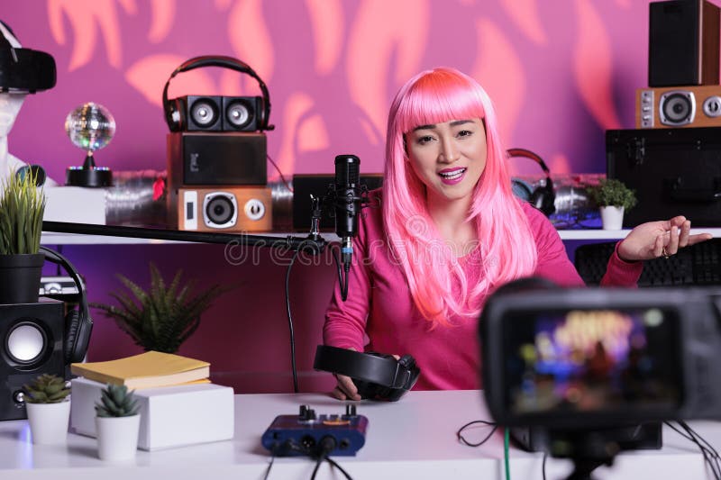 Portrait of Smiling Content Creator Sitting at Desk Table Recording ...
