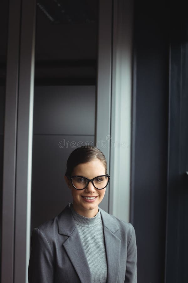Portrait of Smiling Counselor Stock Image - Image of business, sitting ...