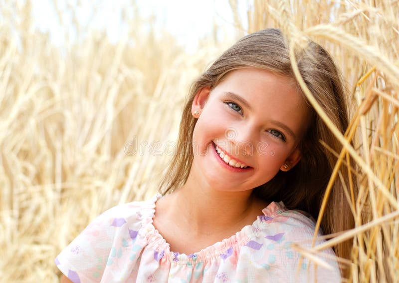 Portrait of Smiling Cute Little Girl Child on Field of Wheat Stock ... Portrait of Smiling Cute Little Girl Child on Field of Wheat Stock ...