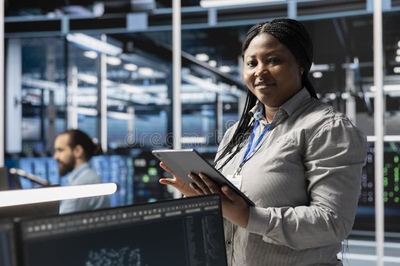Portrait of Smiling Data Center Programmer Using Tablet To Update Servers Tech Stock Image ...