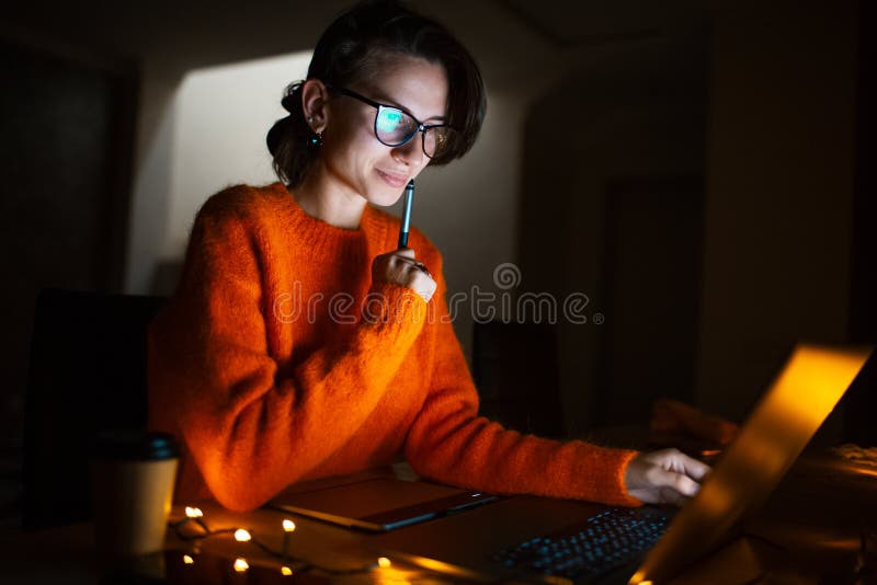 Portrait Of Smiling Designer Girl Working At Graphic Tablet On Laptop