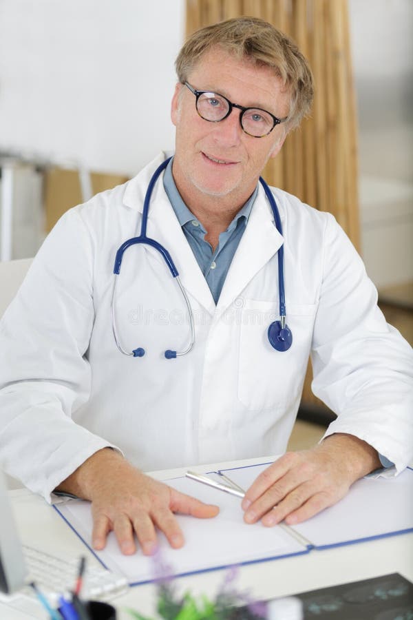 Portrait Smiling Doctor in Office Stock Photo - Image of confidence ...