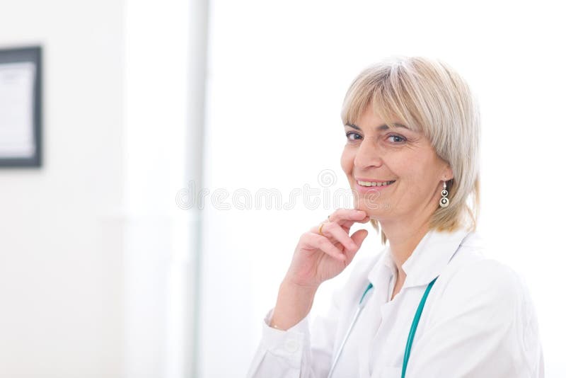 Portrait of Smiling Elderly Doctor Stock Image - Image of practice ...
