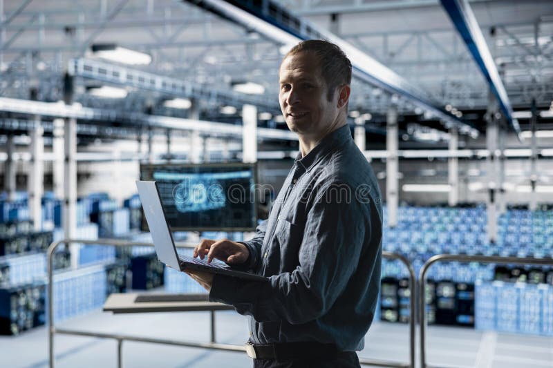 Portrait of Smiling Engineer in AI Data Center Monitoring Error Logs ...