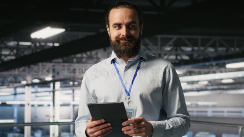 Portrait of Smiling Engineer in Data Center Monitoring AI LLM Visualization Stock Footage ...