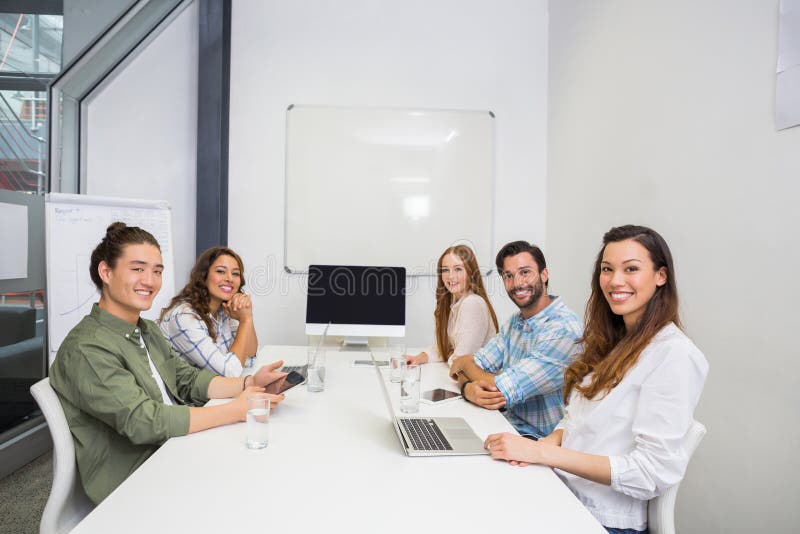 Portrait of Smiling Executive in Conference Room during Meeting Stock ...