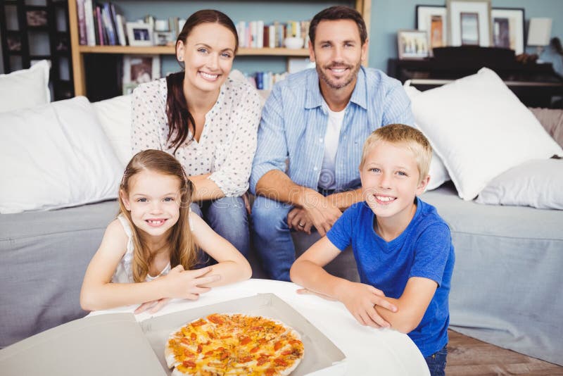 Portrait of Smiling Family with Pizza Stock Image - Image of cheerful ...