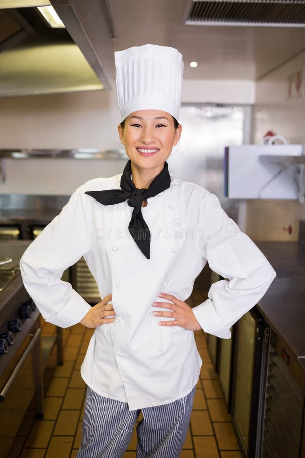 Portrait of Smiling Female Cook in Kitchen Stock Photo - Image of ...