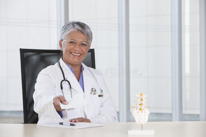 Portrait of Smiling Female Doctor Stock Photo - Image of face ...