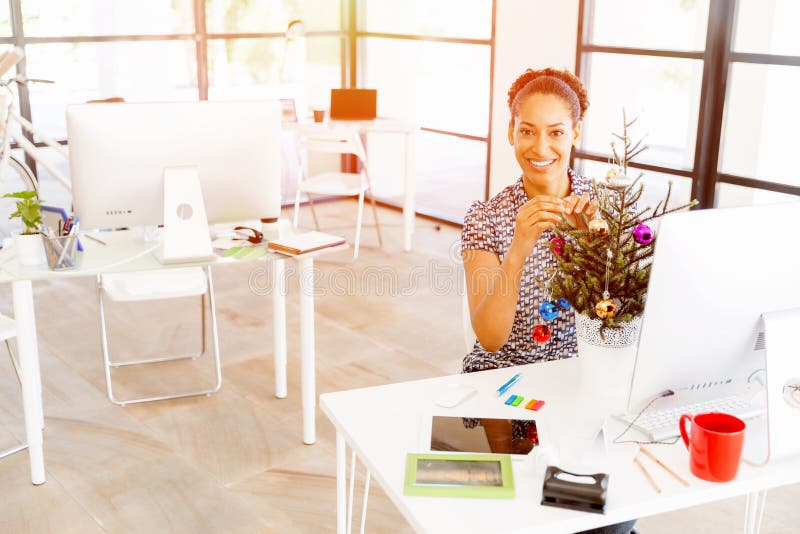 Portrait of Smiling Female Office Worker with Christmas Tree Stock ...