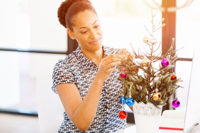 Portrait of Smiling Female Office Worker with Christmas Tree Stock ...