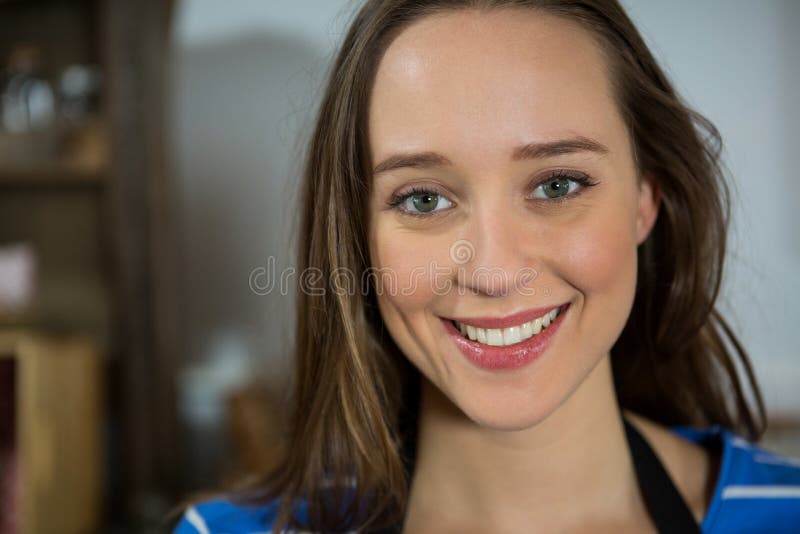 Portrait of Smiling Female Staff Stock Image - Image of people, house ...