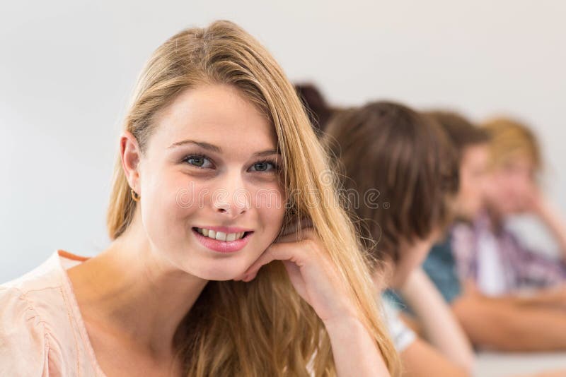 Portrait of Smiling Female Student in Classroom Stock Image - Image of ...