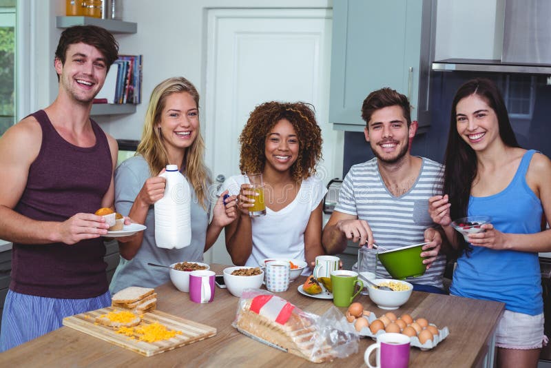 Portrait of Smiling Friends with Food Stock Photo - Image of domicile ...