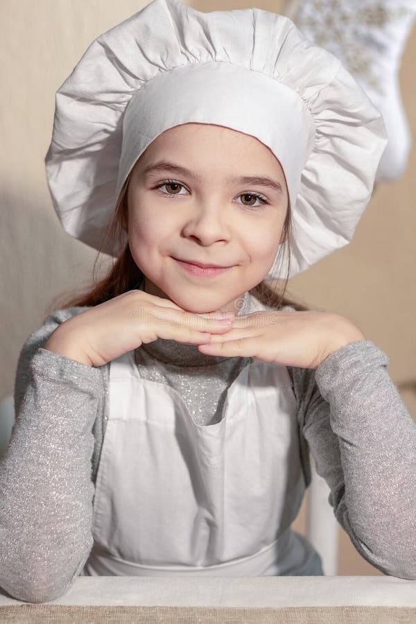 Portrait of a Smiling Girl in a Chef S Hat Stock Image - Image of ...