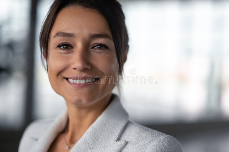 Portrait of a Smiling Good-looking Woman in White Jacket Stock Photo ...