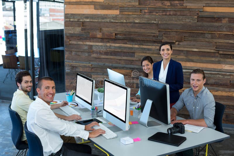 Portrait of Smiling Graphic Designers while Working on Personal ...