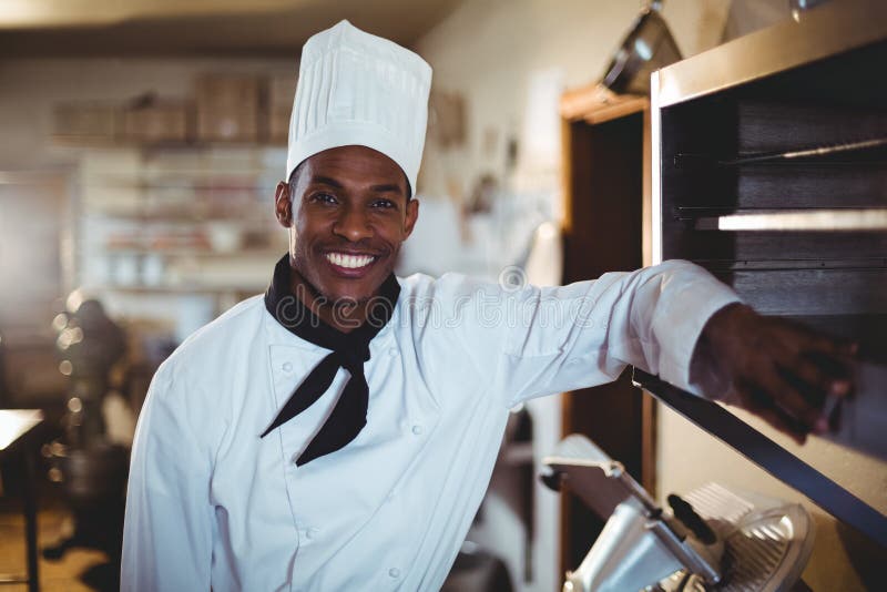 Head Chef and Waiter Discussing Menu Stock Image - Image of kitchen ...