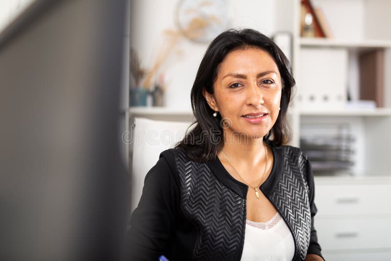 Portrait of Smiling Hispanic Female Office Employee Stock Photo - Image ... Portrait of Smiling Hispanic Female Office Employee Stock Photo - Image ...