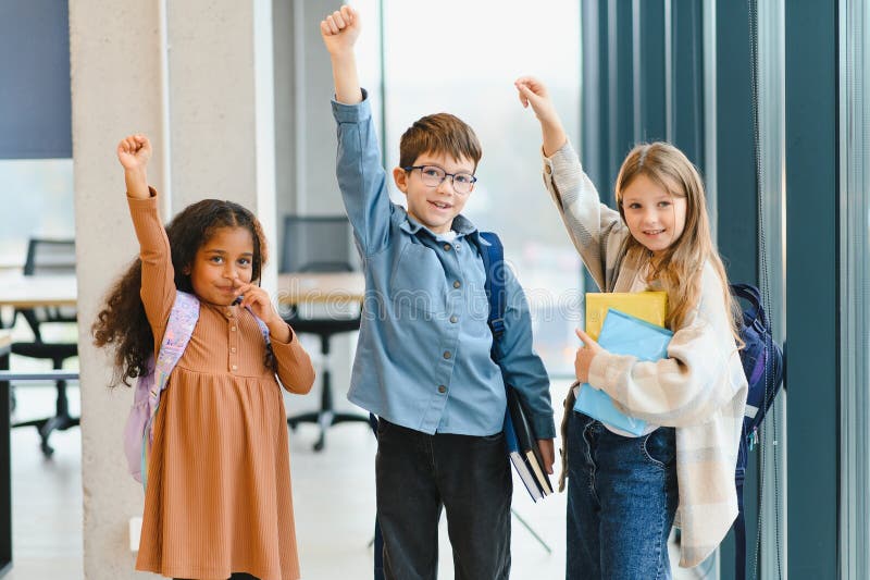 Portrait of Smiling Little School Kids in School Corridor Stock Image ...