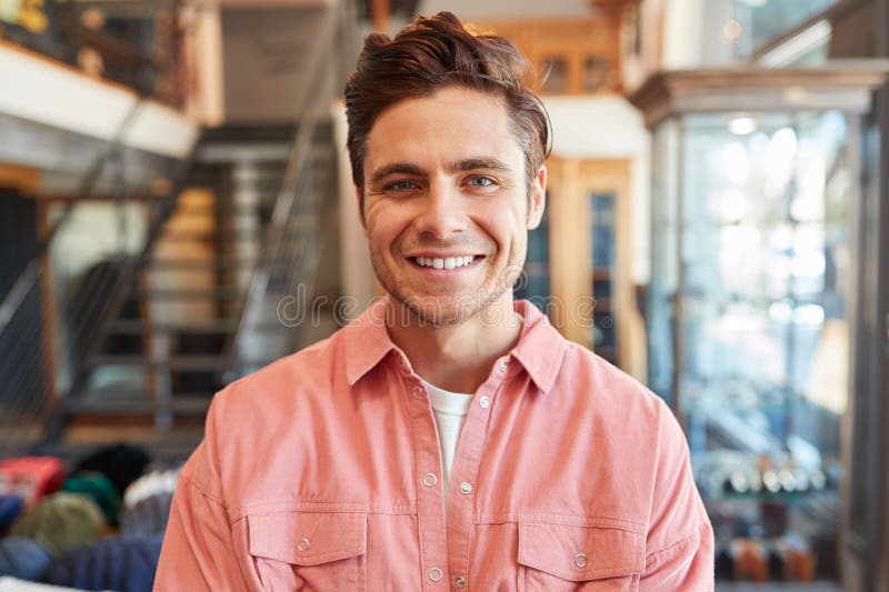 Portrait Smiling Male Owner Fashion Store Standing Front Clothing ... Portrait Smiling Male Owner Fashion Store Standing Front Clothing ...