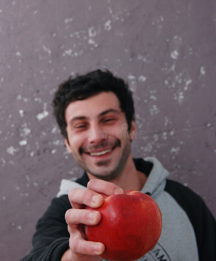 Portrait of a Smiling Man with Apple Stock Photo - Image of attractive ...