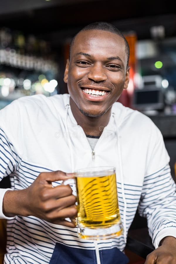 Portrait of Smiling Man Drinking a Beer Stock Image - Image of ...