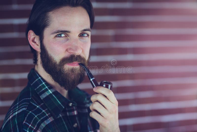 Portrait of Smiling Man with Smoking Pipe Stock Image - Image of brick ...