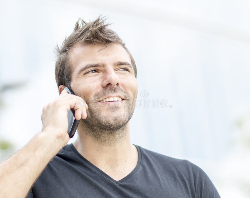 Portrait of Smiling Man Talking on Phone. Stock Photo - Image of ...