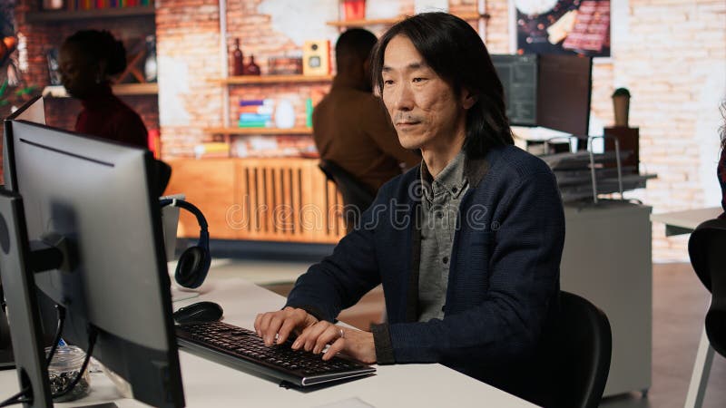 Portrait of Smiling Man Using Coding Platform in Silicon Valley ...