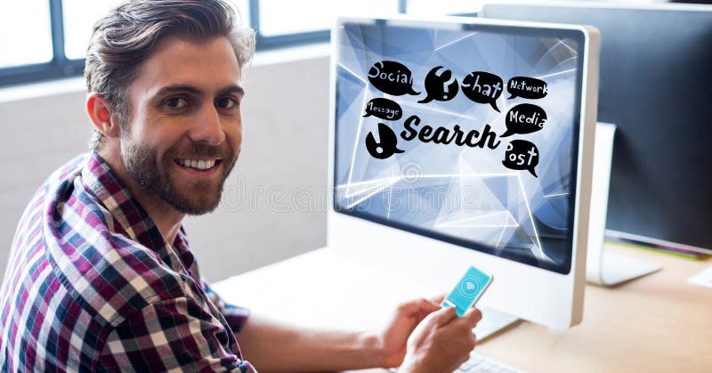 Portrait of Smiling Man Using Mobile Phone with Text on Computer Stock ...