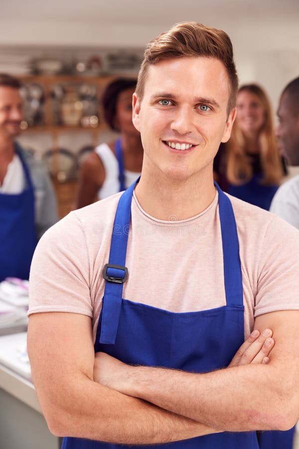 Portrait of Smiling Man Wearing Apron Taking Part in Cookery Class in ...