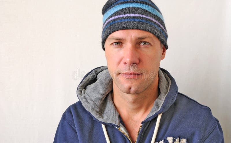 Portrait of the Smiling Man Wearing a Knitted Hat Stock Image - Image ...