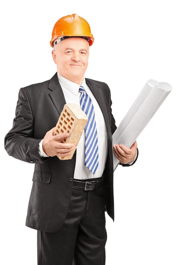 Portrait of a Smiling Mature Architect Holding a Brick Stock Photo ... Portrait of a Smiling Mature Architect Holding a Brick Stock Photo ...