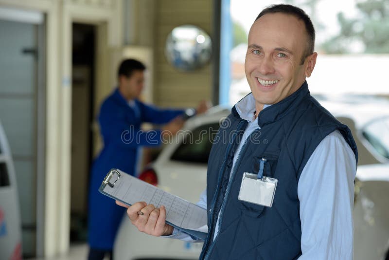 Portrait Smiling Mechanic Supervisor Stock Image - Image of coverall ...