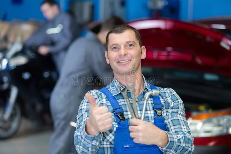 Portrait Smiling Mechanic Thumbs Up Stock Photo - Image of male ...