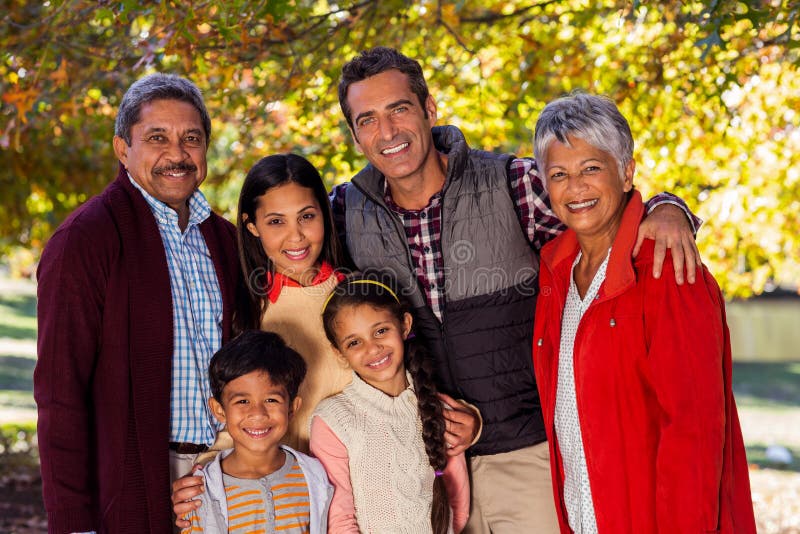 Portrait of Smiling Multi-generation Family at Park Stock Image - Image ...