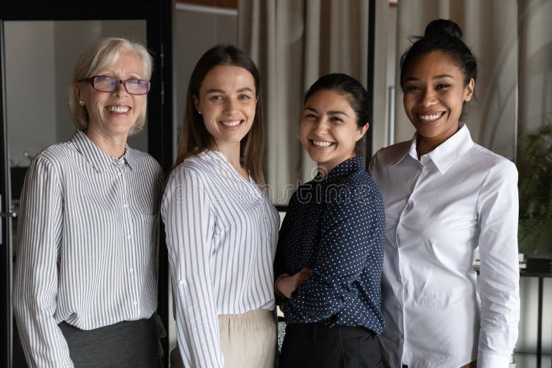 Portrait of Smiling Multiracial Female Colleagues Pose Together Stock ... Portrait of Smiling Multiracial Female Colleagues Pose Together Stock ...