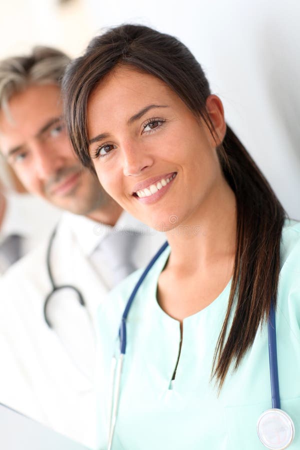Portrait of smiling nurse stock image. Image of professional - 21682265