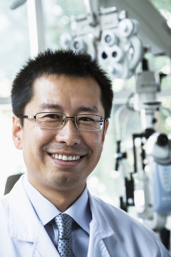 Chinese Optometrist Smiling Camera Stock Photos - Free & Royalty-Free ...