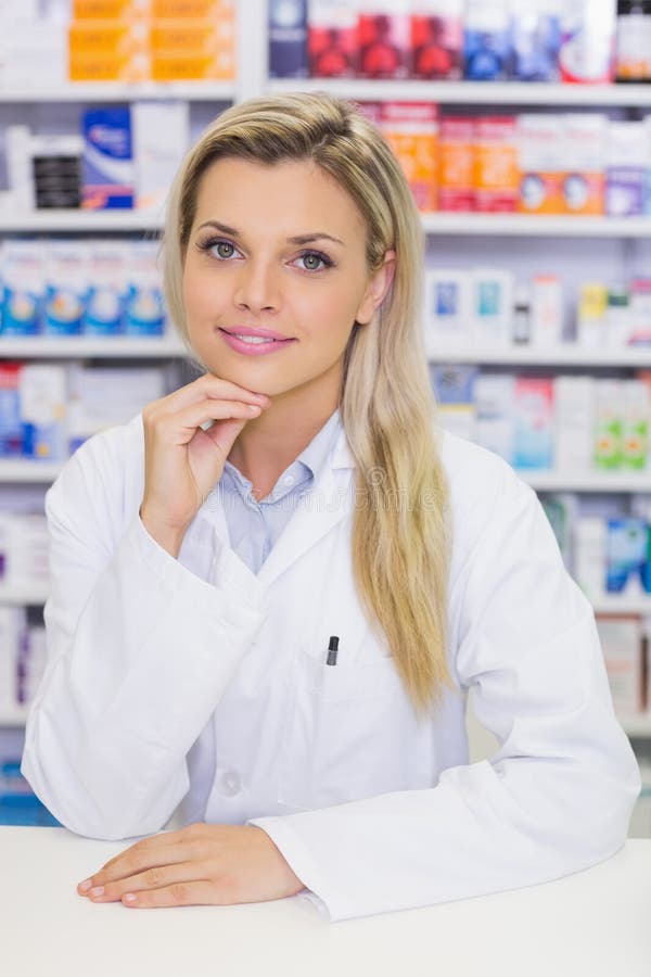 Portrait of a Smiling Pharmacist Looking at Camera Stock Photo - Image ...