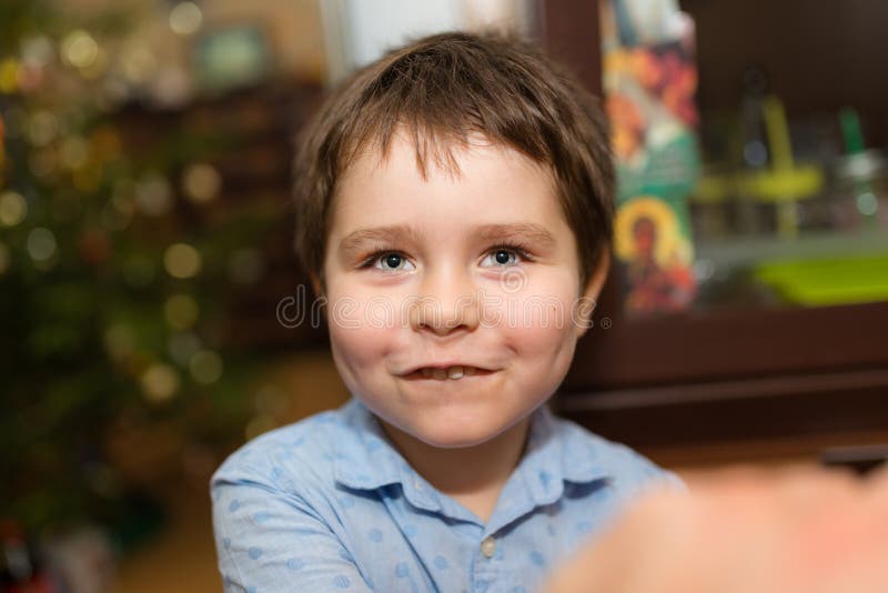 Portrait of a Smiling, Pretty Boy of Several Years in the Children Room ...