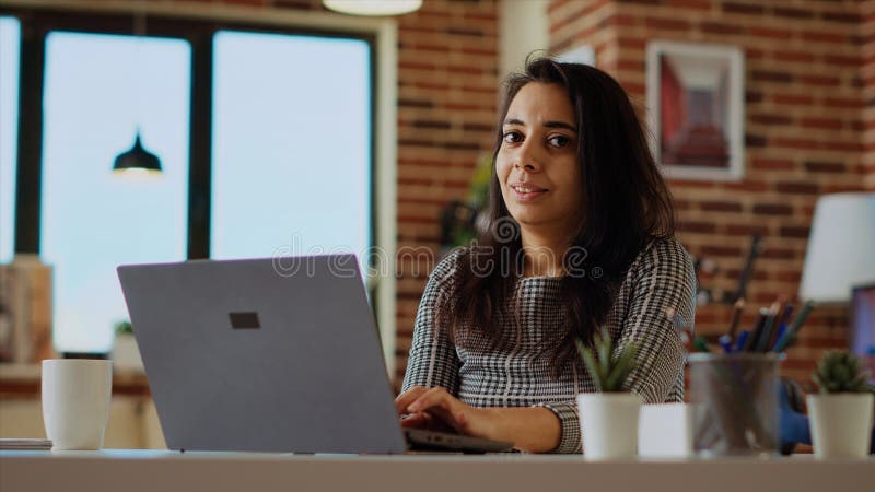 Portrait of Smiling Remote Student Typing Data on Keyboard and Taking ...