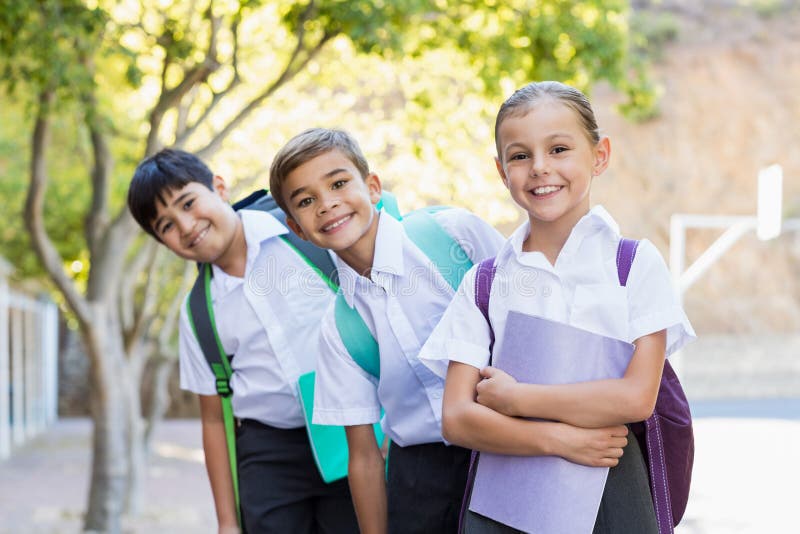 Portrait of Smiling School Kids Standing in Campus Stock Photo - Image ...