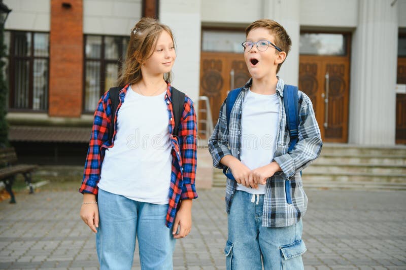 Portrait of Smiling School Kids Standing at School Yard Stock Photo ...
