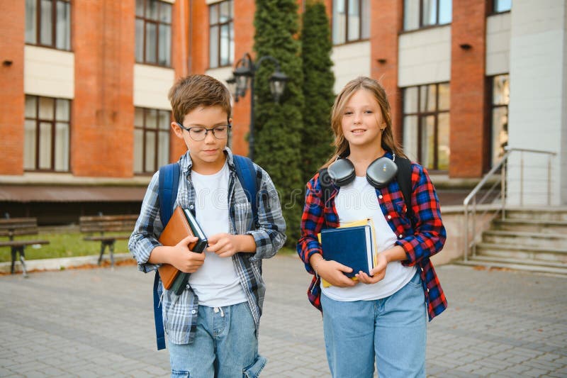 Portrait of Smiling School Kids Standing at School Yard Stock Image ...