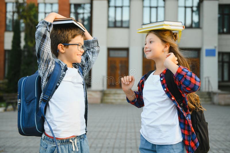 Portrait of Smiling School Kids Standing at School Yard Stock Image ...