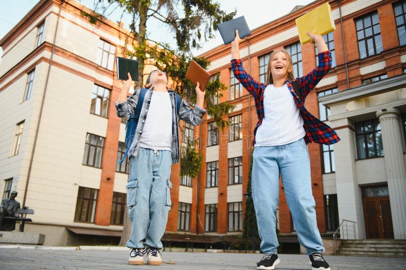 Portrait of Smiling School Kids Standing at School Yard Stock Photo ...