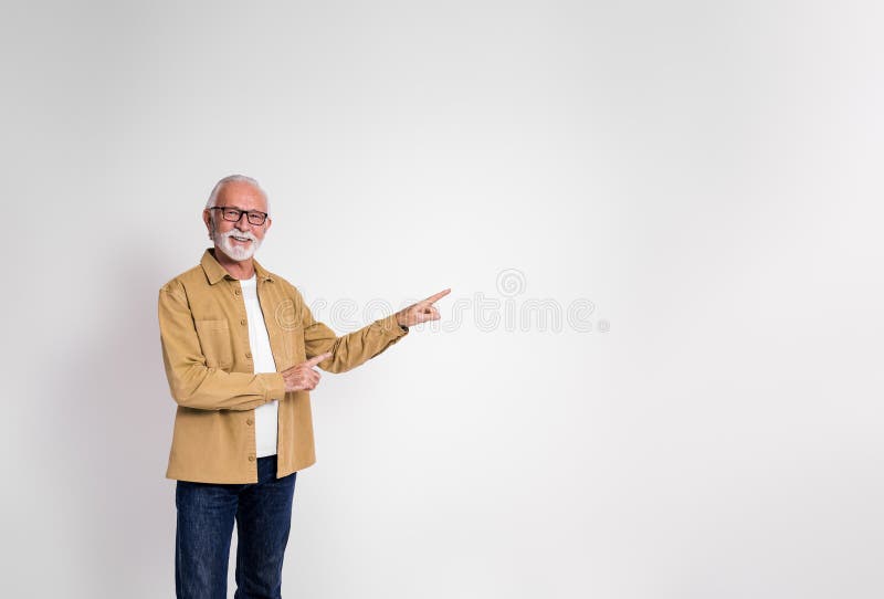 Portrait of Smiling Senior Businessman Aiming at Copy Space for ... Portrait of Smiling Senior Businessman Aiming at Copy Space for ...